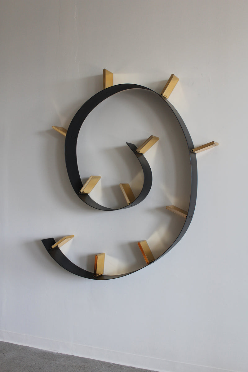 Bookworm Shelf by Ron Arad for Kartell – lecenterpiece